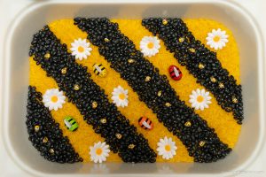 5 Fun and Engaging Bee Sensory Bin Ideas - Two Crafty Makers
